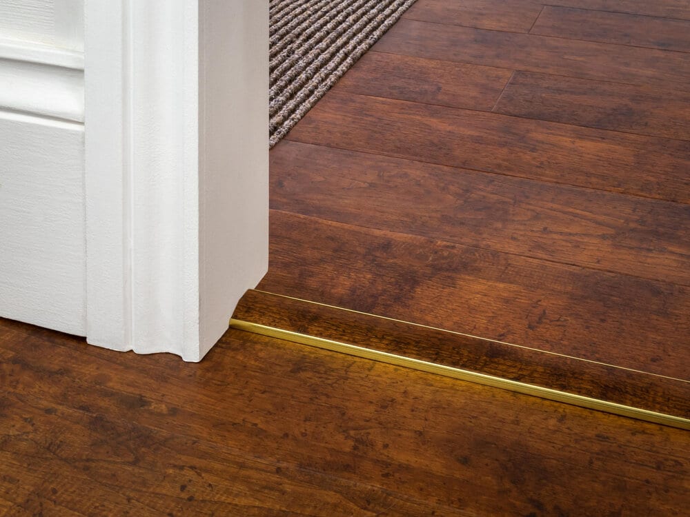 Ali Tramline Reducer Transition in Polished Brass | Seamless Floor Join